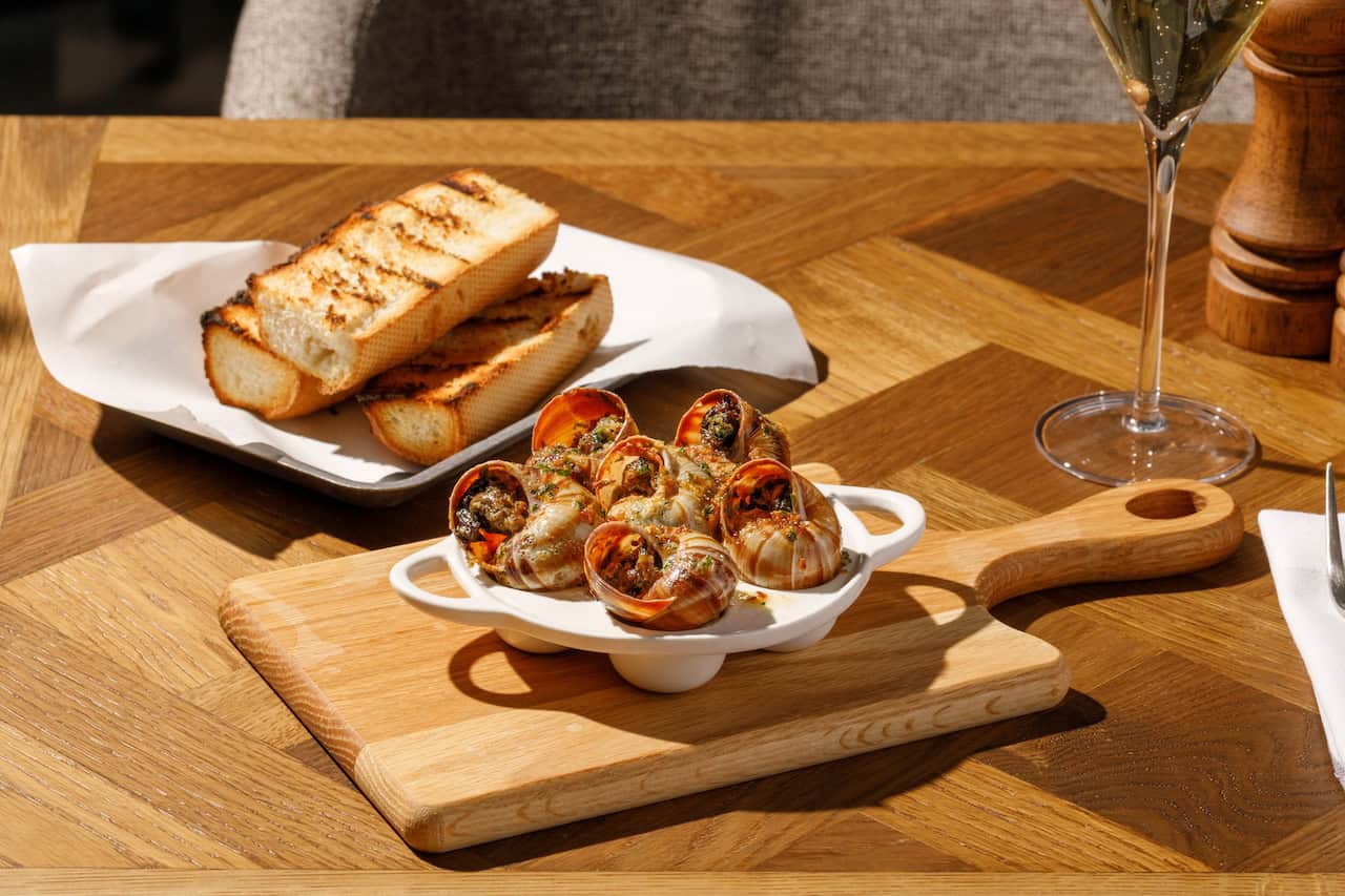 Revolve Brasserie - A new Dining Concept with Revolving Food, Art ...